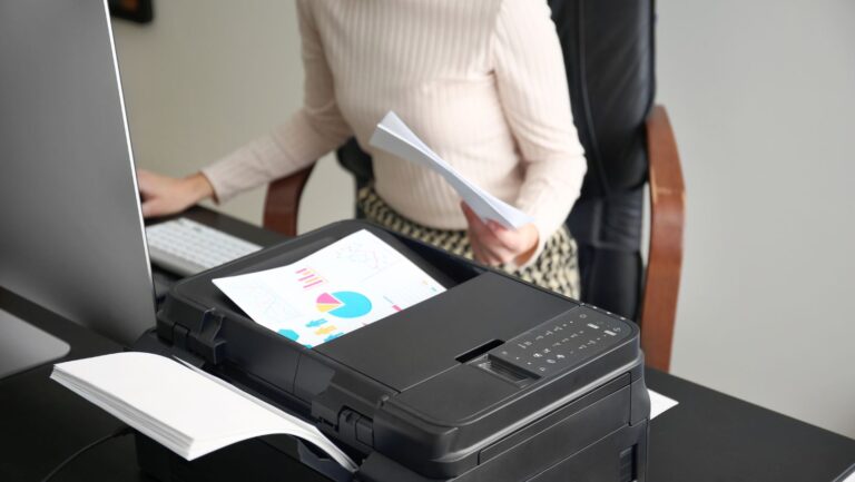 How do I enlarge a scanned document for printing?